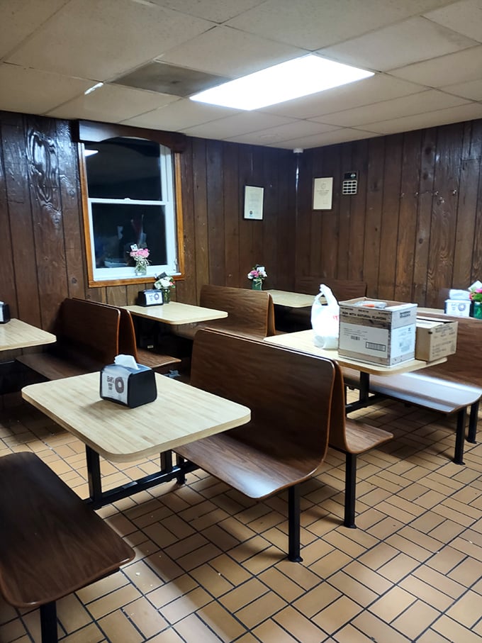The dining area invites lingering conversations over coffee and the kind of donuts that inspire loyalty.
