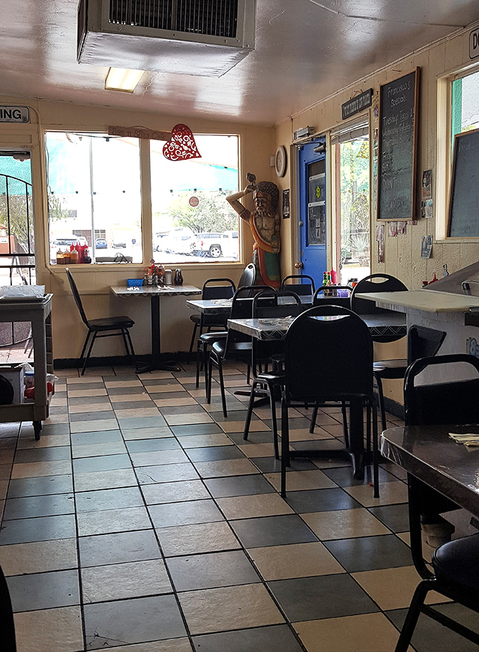 The dining room at Frank's embraces that classic "been here forever" vibe where the décor hasn't changed because it never needed to.
