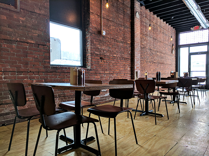 The dining room's minimalist charm lets you focus on what matters—the imminent arrival of smoked meat perfection at your table.