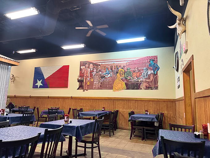 Another dining room view showcases Texas pride with the state flag and historical artwork—subtle reminders of where this comfort food tradition began.