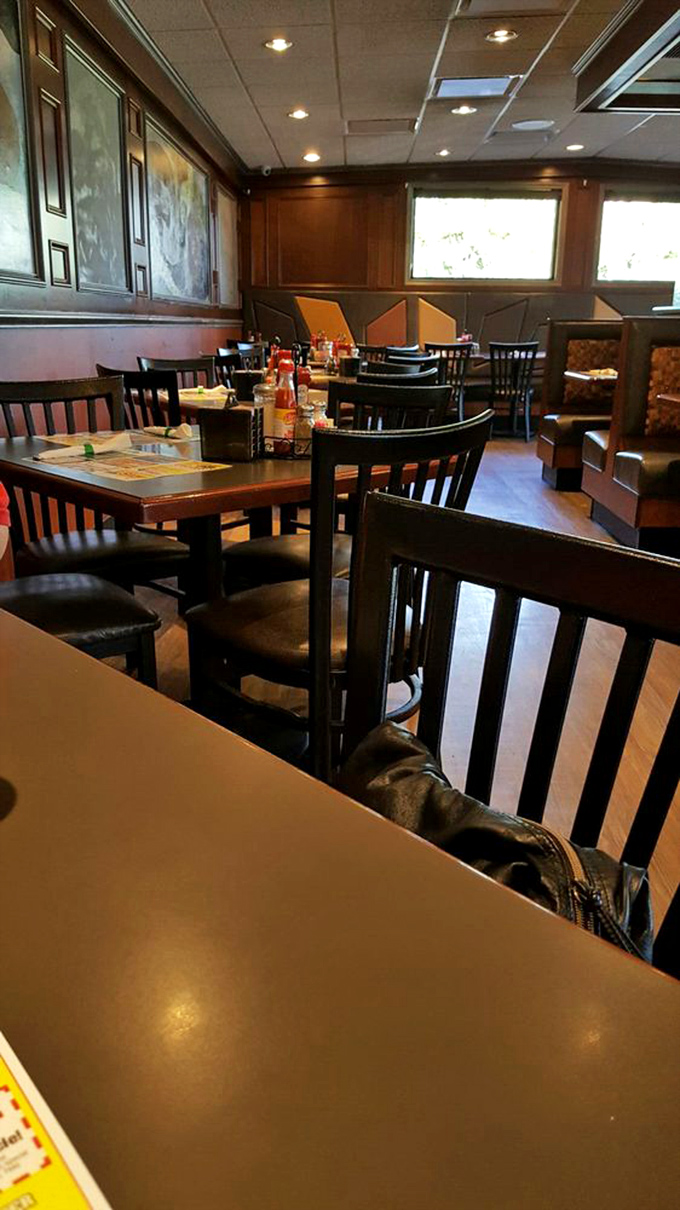 Rich wood paneling and comfortable seating create the perfect backdrop for lingering conversations and second cups of coffee. Diner ambiance elevated.