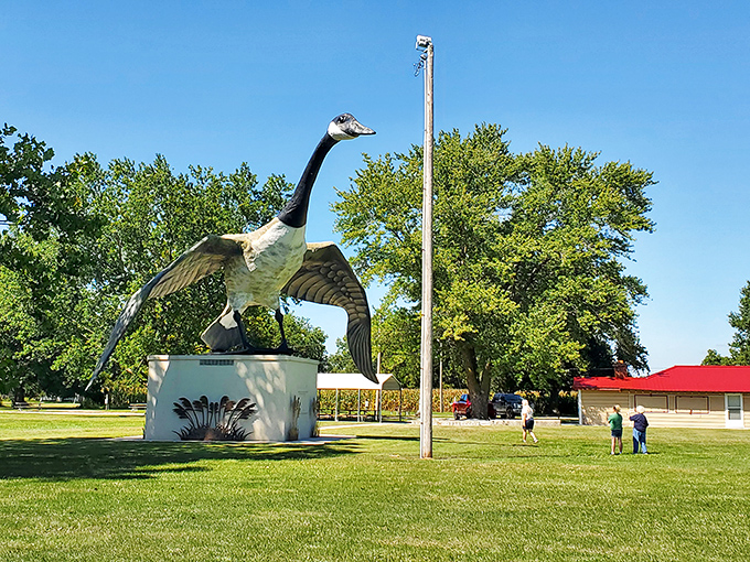 The statue's concrete base houses a small utility room. Practical infrastructure supporting magnificent art—a metaphor for small-town America itself.