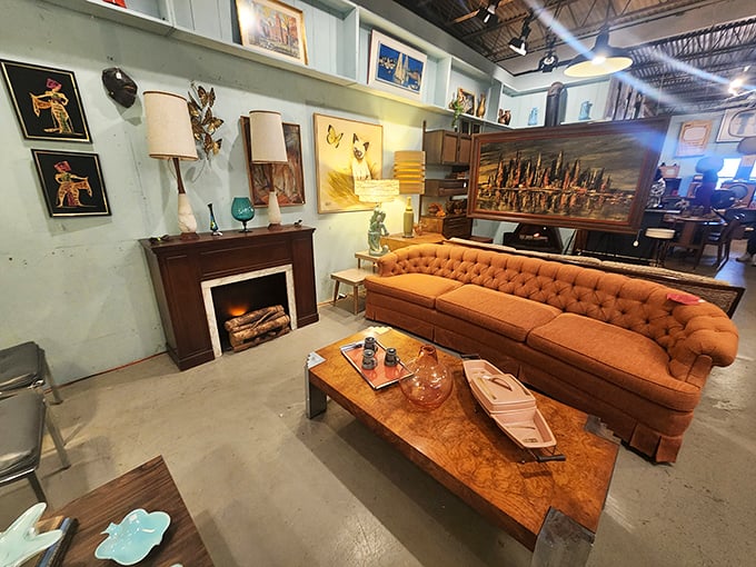 That tufted orange sofa has hosted more fascinating conversations in its lifetime than most talk show hosts. Mid-century luxury at its most inviting.