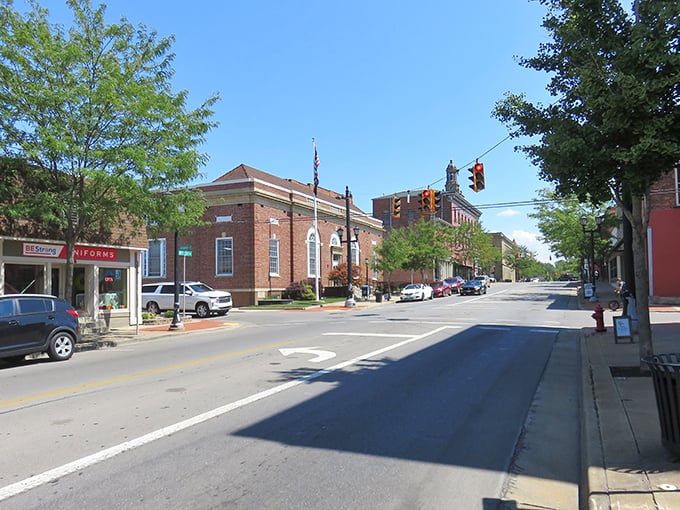 Brick buildings and blue skies create Norwalk's timeless Main Street tableau. The courthouse dome watches over daily life like a benevolent architectural guardian.
