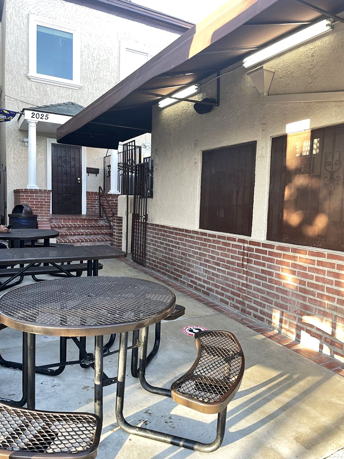 The outdoor seating area feels like dining in a friend's backyard—casual, comfortable, and somehow making everything taste better.