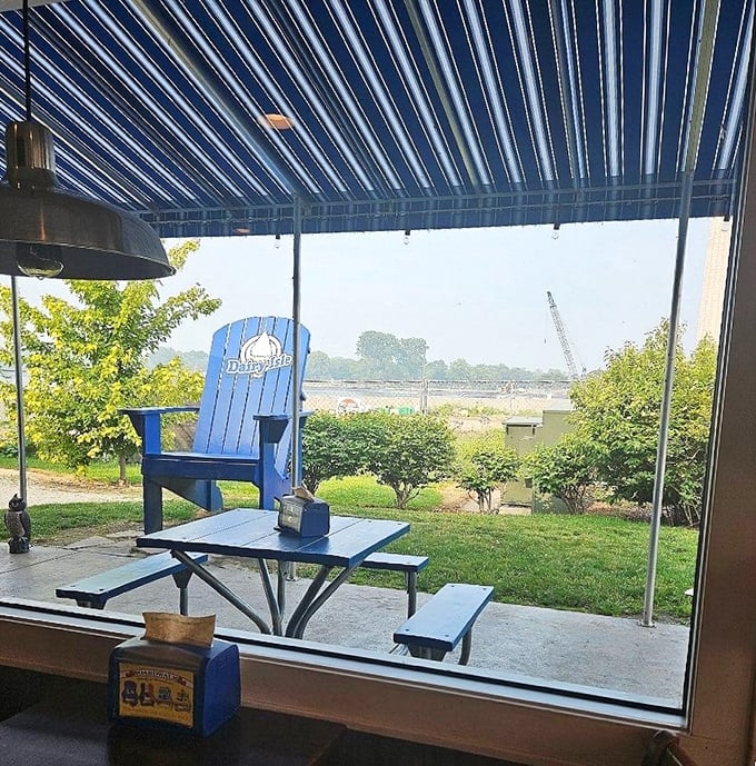 That signature blue Adirondack chair framed by Lake Erie's vastness is practically begging for your social media moment. #IslandLife