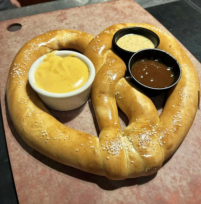 This isn't just any pretzel—it's a Pennsylvania masterpiece with three dipping sauces that make you question why you've wasted time on lesser pretzels.