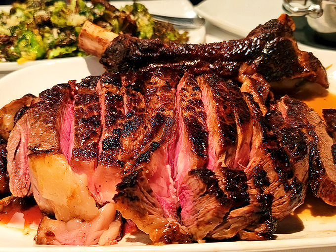 This bone-in ribeye isn't just dinner—it's a primal experience with a perfect sear that would make cavemen weep with joy.