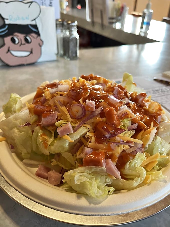 This isn't "deconstructed" or "reimagined" salad. It's just good old-fashioned chopped salad with ham, cheese, and dressing that means business.