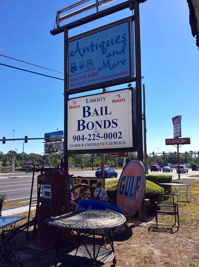 The iconic sign shares space with a bail bonds advertisement—because sometimes the best treasures come with interesting neighbors.