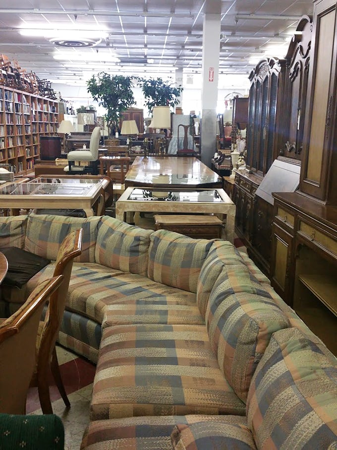 That plaid sectional has seen things – probably the entire run of "Dallas" and countless TV dinners. It's practically Americana on cushions.