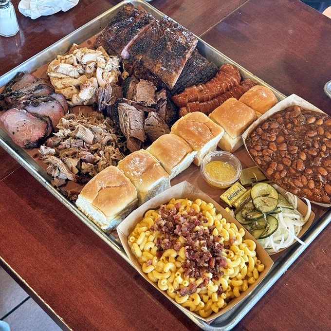 "The Mammoth" isn't just named after a nearby mountain—it's a geological formation of perfectly smoked meats and sides.