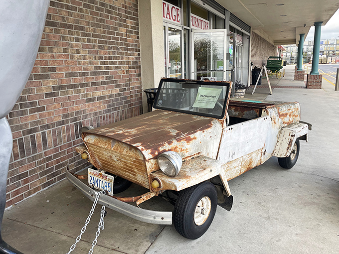 This rusty chariot isn't waiting for a prince—it's guarding the entrance like a time-worn sentinel of adventures past.