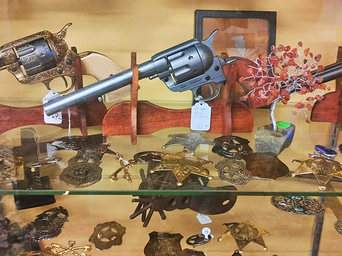 The Wild West lives on behind glass – these vintage firearms and badges tell tales of frontier justice and Hollywood dreams.