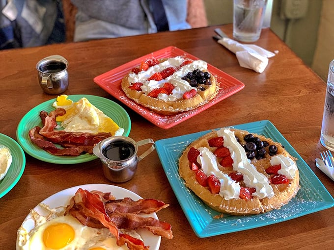 A classic breakfast that speaks the universal language of comfort—golden home fries, toast, eggs, and bacon that would make your grandmother proud.