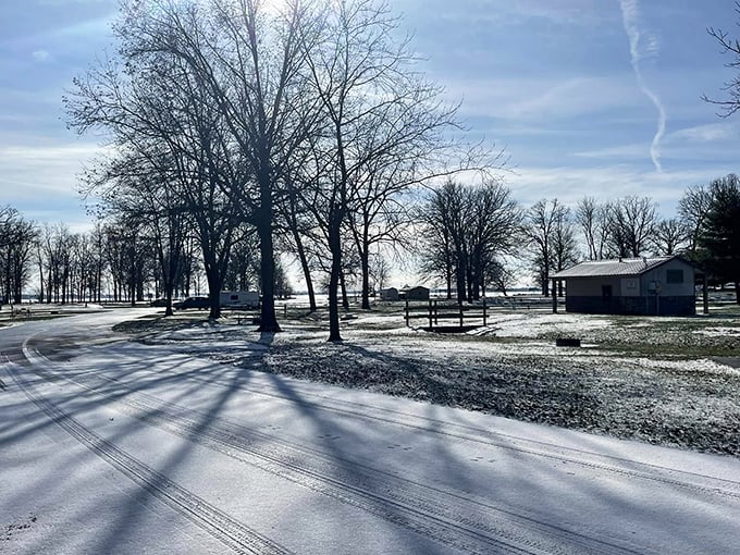 Winter transforms Indian Lake into a serene snow globe – those long shadows creating nature's sundial across the pristine white canvas.