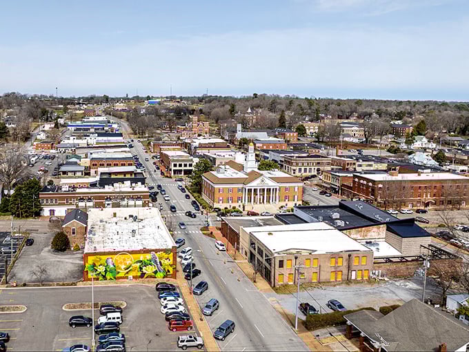 An aerial view of Athens reveals its well-preserved downtown district, where historic buildings house local businesses serving this tight-knit community.