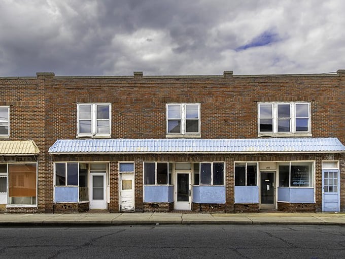 Faded storefronts tell stories of a working waterfront town where authentic trumps trendy every day of the week.