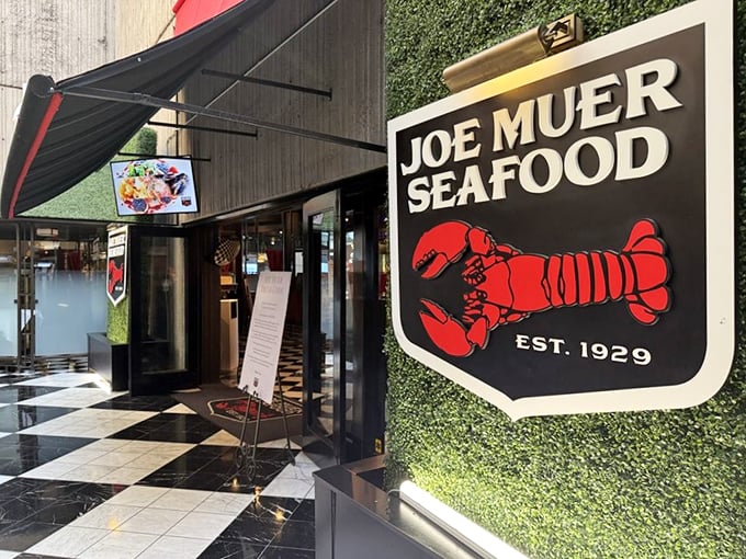 Joe Muer's sleek entrance and iconic red lobster sign – Detroit's seafood tradition with a modern twist.