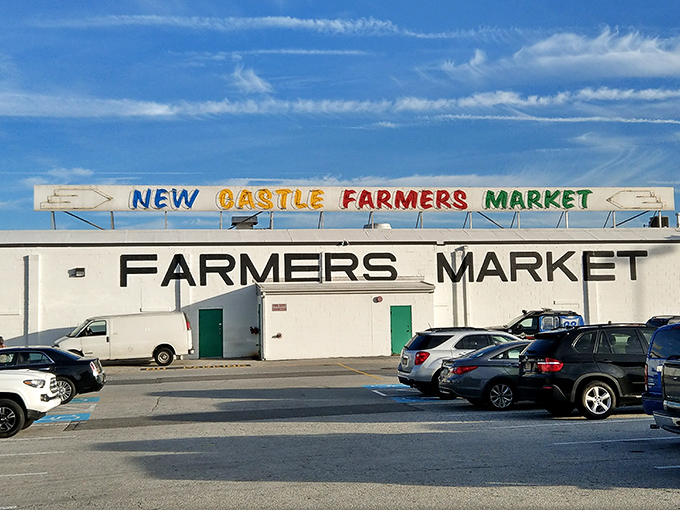 The New Castle Farmers Market's unassuming exterior belies the wonderland of treasures waiting just beyond those doors.