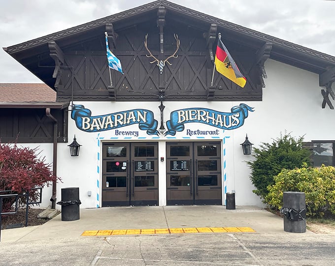 The Bavarian Bierhaus stands proud with its alpine-inspired architecture. Those flags aren't just decoration—they're a promise of authentic German experiences.