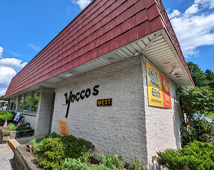 Yocco's distinctive white building with its burgundy roof—a landmark for Allentown hot dog pilgrims.