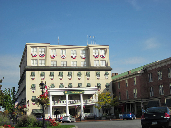 The American flags adorning Gettysburg's buildings aren't just decorations – they're reminders of the history that makes this charming town so significant.
