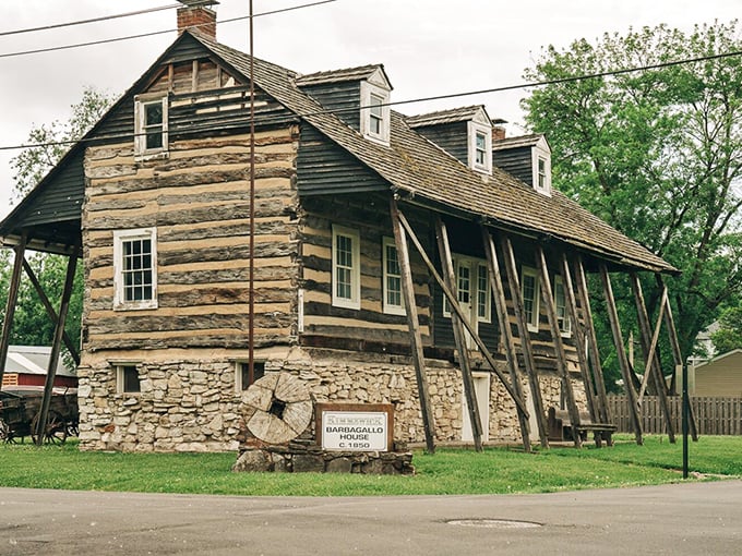 This reconstructed log cabin represents Missouri's frontier heritage, where pioneers built dreams from timber and determination.