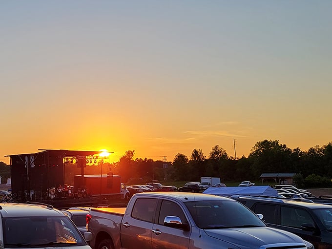Golden hour at the drive-in—when the sun sets, the projector fires up, and everyday life fades like credits rolling.