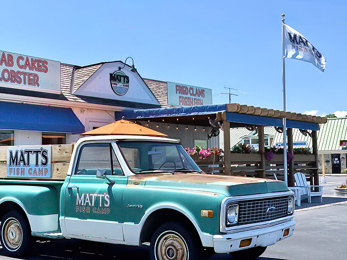 That vintage turquoise truck isn't just for show—it's the perfect mascot for Matt's Fish Camp, where coastal charm meets seafood perfection in Lewes.