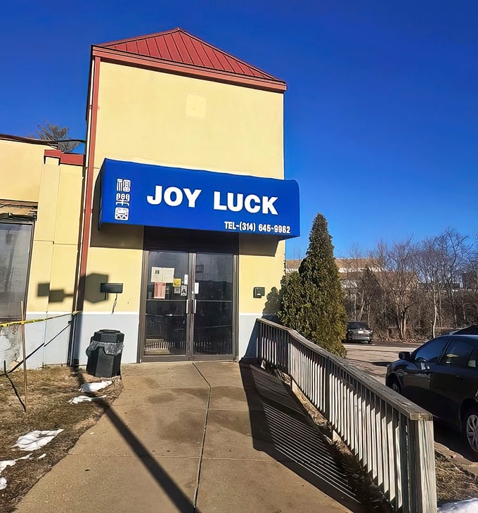 The blue awning of Joy Luck stands as a beacon of culinary promise, like finding a $20 bill in an old jacket pocket—unexpected but absolutely delightful.