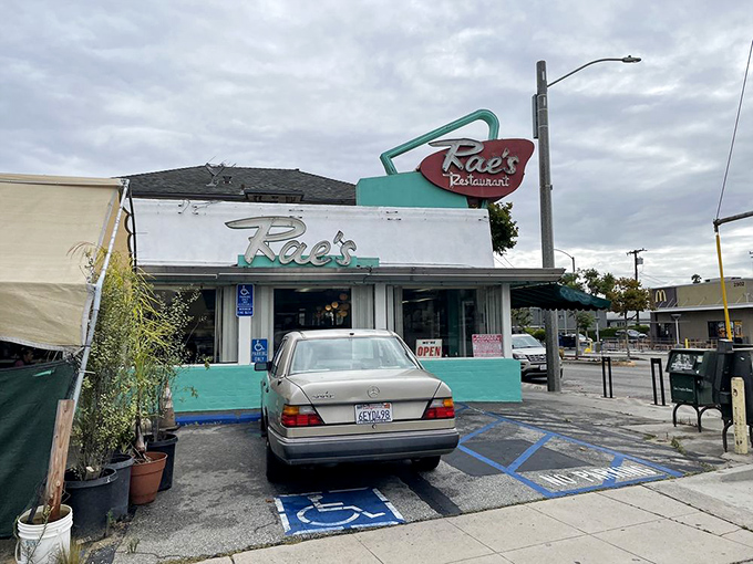 That iconic turquoise exterior isn't just eye-catching—it's a time portal to when diners ruled American cuisine and neon signs were the Instagram of their day.