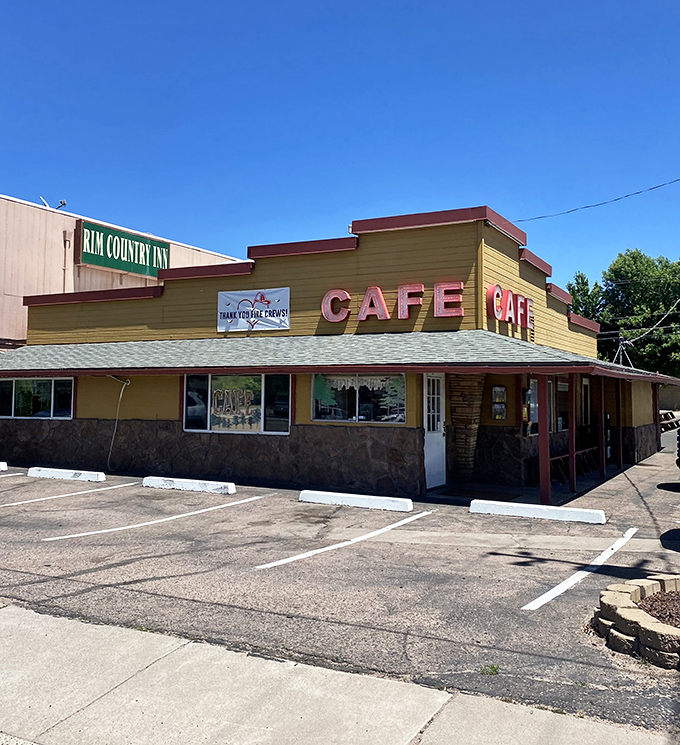 1. The iconic yellow exterior of Beeline Cafe stands like a beacon of breakfast hope on Payson's main drag, promising comfort food salvation to hungry travelers.
