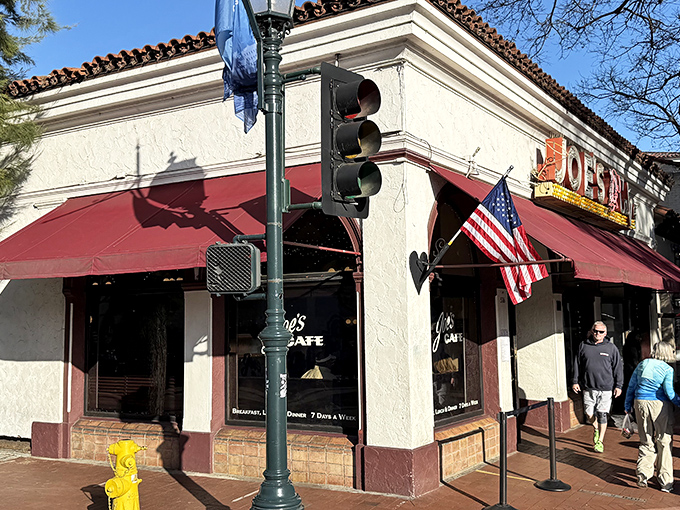 That iconic red awning and vintage signage aren't just decoration—they're a promise of the timeless comfort waiting inside Joe's Café on State Street.
