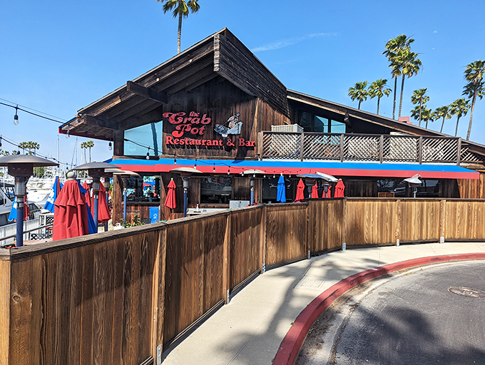 The quintessential California seafood joint: weathered wood, swaying palms, and a neon sign promising treasures from the sea. Paradise found.
