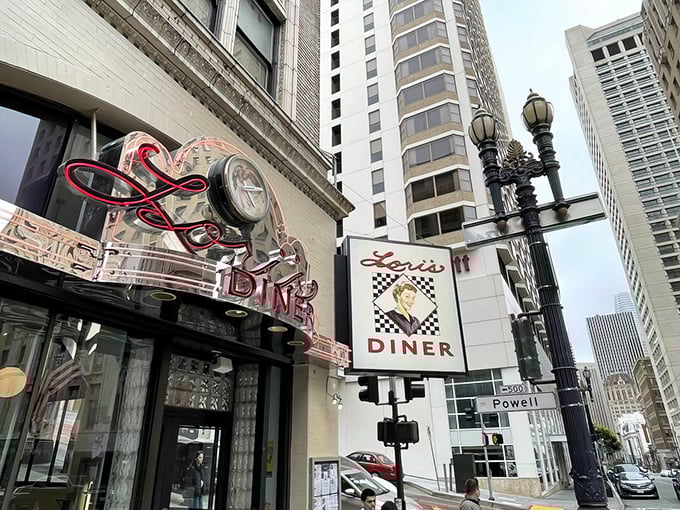 The iconic neon sign of Lori's Diner glows like a beacon of nostalgia on Powell Street, promising comfort food and a trip back in time.