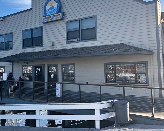 The unassuming exterior of Mitch's Seafood proves once again that the best coastal treasures aren't dressed to impress—they're too busy perfecting what's on your plate.