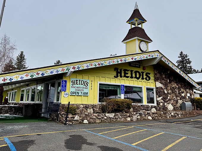 The Swiss chalet meets mountain lodge architecture of Heidi's stands proudly against Tahoe's blue sky, beckoning hungry travelers with its iconic clock tower.