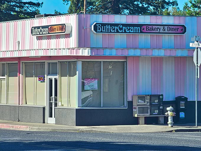 The pink-and-white striped exterior of Butter Cream isn't just a building—it's a promise of nostalgic delights waiting inside. Like a dessert come to life!