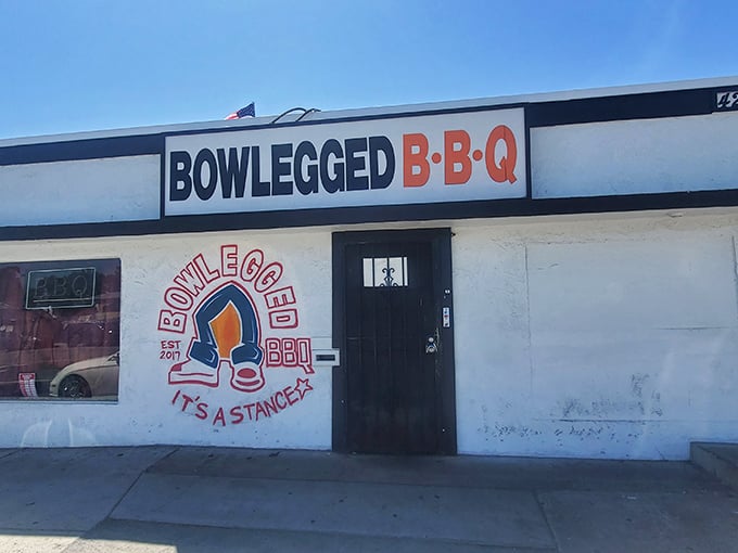 The unassuming white exterior with its bold signage and "It's a stance" logo is like finding a secret password to barbecue nirvana.