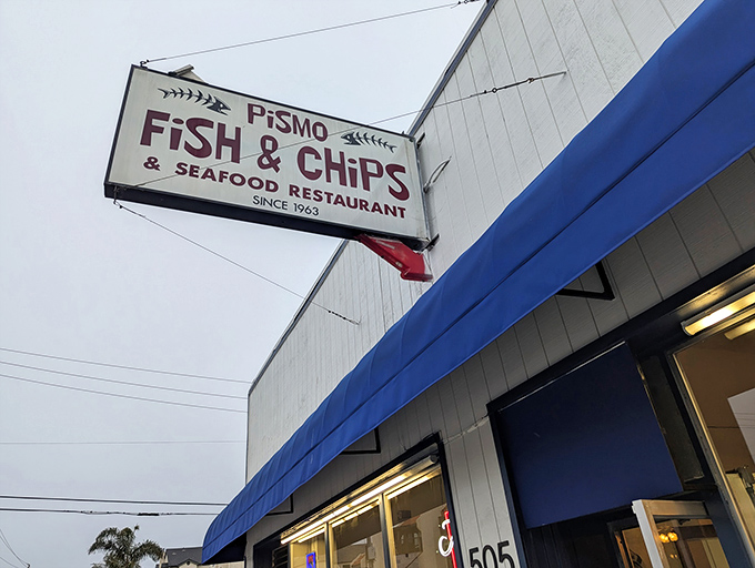 That blue awning beckons like a lighthouse for hungry souls seeking California's coastal treasures.