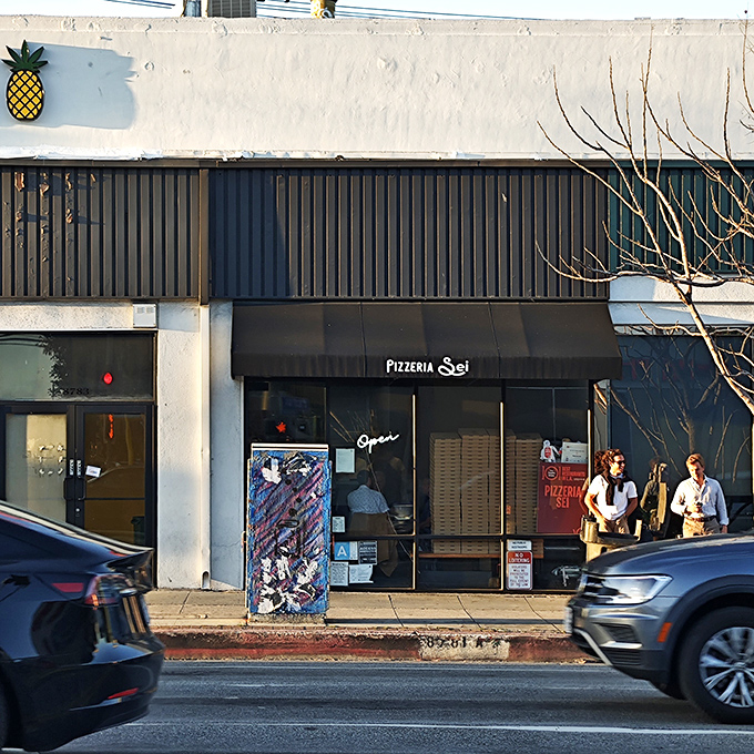 Sleek, modern, and unassuming from the outside—Pizzeria Sei's exterior belies the pizza paradise waiting within. The best treasures often hide in plain sight.