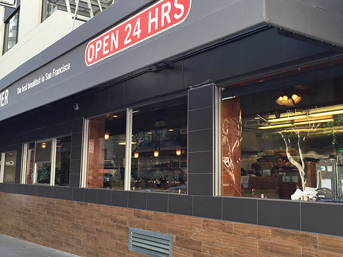 The glowing "OPEN 24 HRS" sign isn't just illuminating the street—it's a beacon of hope for hungry night owls and early birds alike.