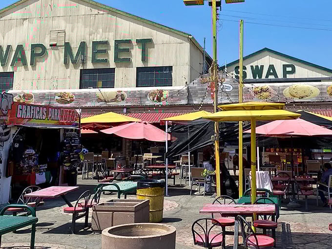 The iconic white buildings with bold green "SWAP MEET" lettering promise treasures inside that'll make your wallet sing with joy.