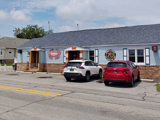 The iconic blue exterior with its bold red crab logo promises seafood treasures within – Delaware's ultimate "come as you are" dining destination.