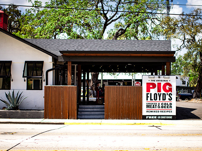 The unassuming exterior of Pig Floyd's hides a flavor revolution within. Modern wooden accents and that bold sign promise barbecue with attitude.