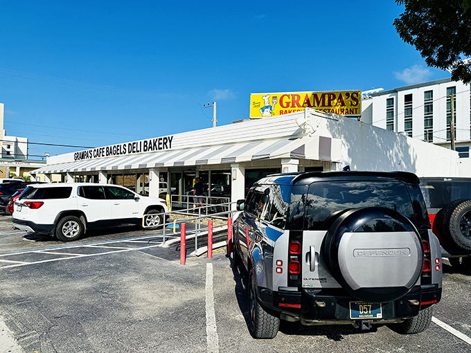 The classic striped awning of Grampa's beckons like a culinary lighthouse on South Federal Highway, promising delicious refuge from ordinary breakfasts.
