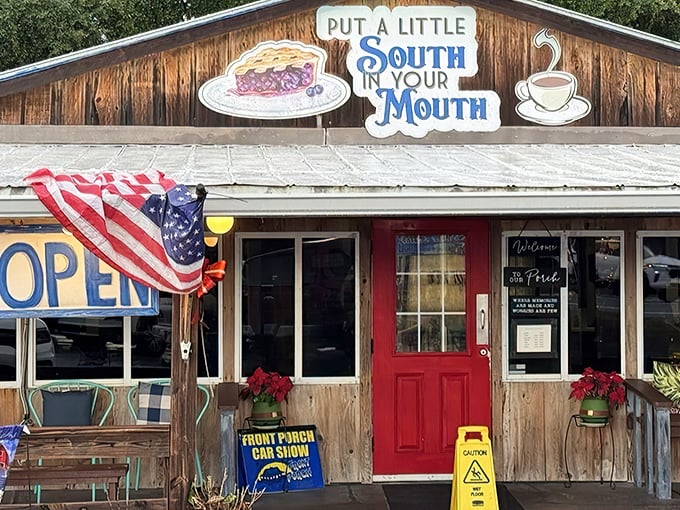 The promise of Southern comfort beckons from this rustic wooden facade. That red door isn't just an entrance—it's a portal to flavor country.