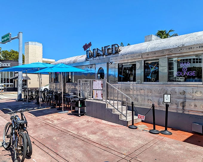 The gleaming stainless steel exterior of 11th Street Diner shines like a time machine that happens to serve excellent coffee and Cuban sandwiches.