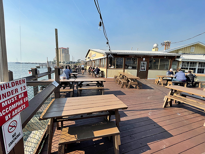 The waterfront deck at The Shack isn't just seating—it's front-row tickets to nature's best show. Gulf views and seafood: Florida's perfect pairing.